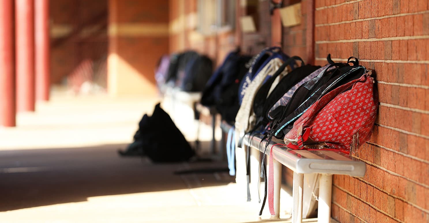 High School student school bags outside the classroom at an educational ...